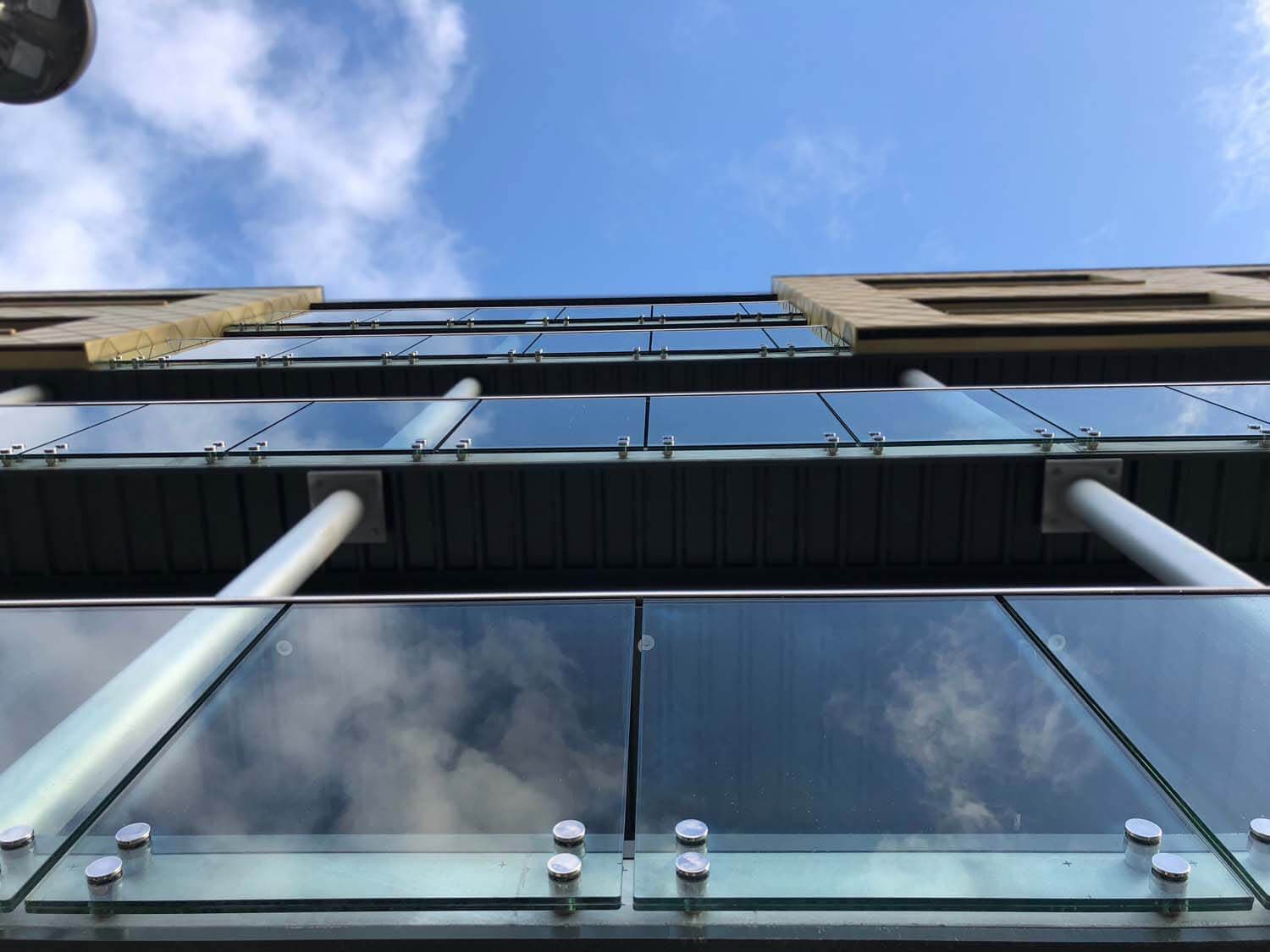 Glass Button Balustrades with optional Steel Handrail